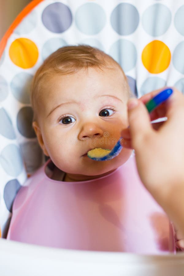 Baby feeding stock image. Image of baby, portrait, expression - 27103567