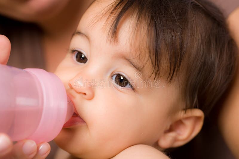 Baby feeding stock image. Image of adorable, cuddly, female - 7689947