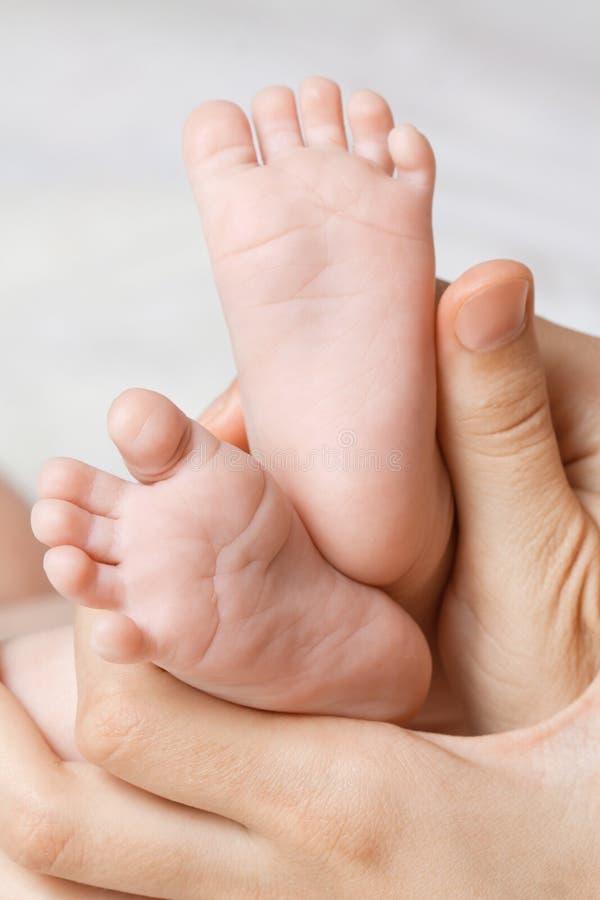 Two Tiny Baby Feet stock image. Image of skin, newborn - 2961811