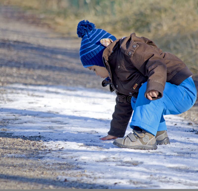 Baby first snow stock image. Image of melt, memories - 35640985