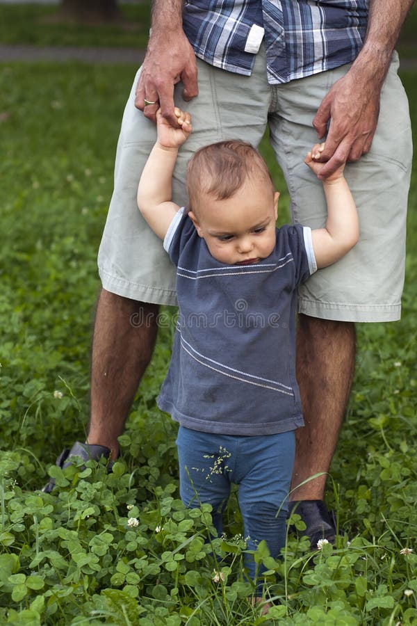 Baby learning to walk stock image. Image of little, nature - 13923831