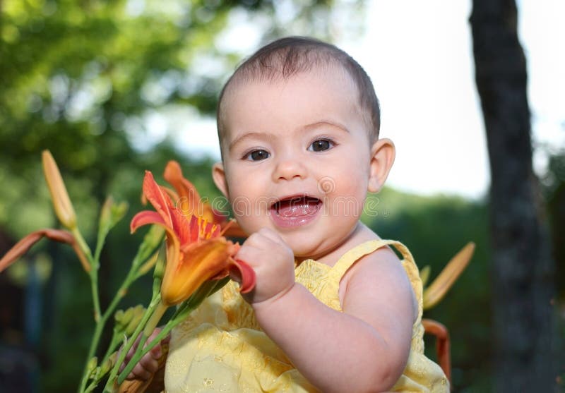 Baby with flower stock photo. Image of beauty, baby, child - 75184388