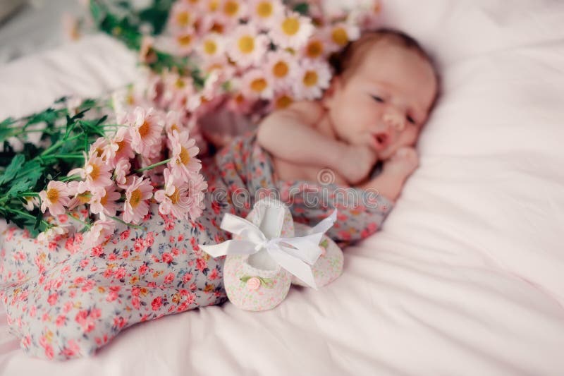Baby in flowers stock photo. Image of flower, pink, innocent - 27616042
