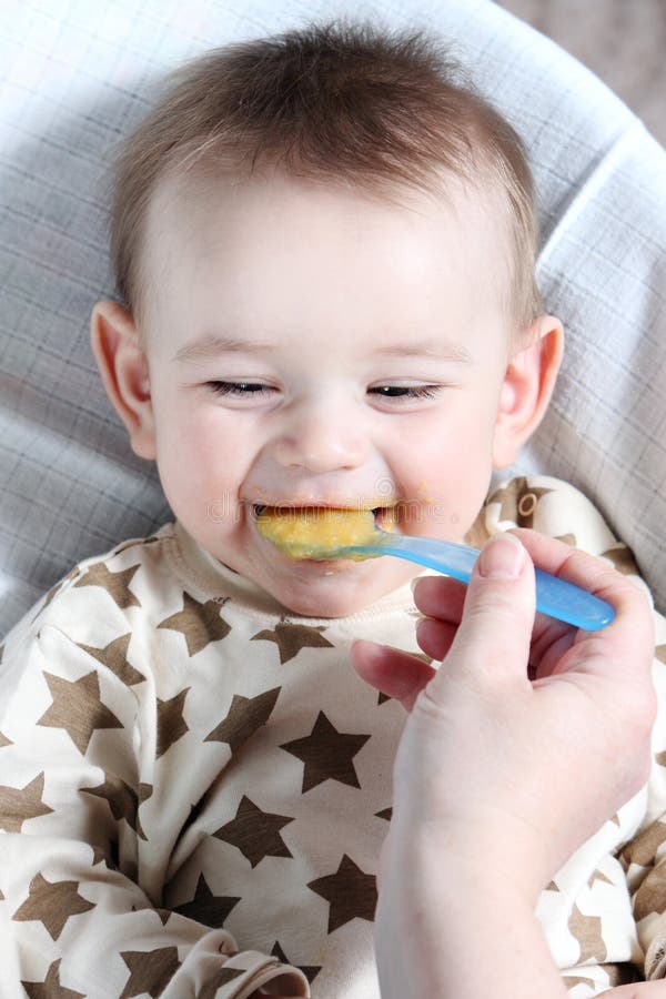 Baby with food stock image. Image of dinner, child, feeding - 27776921