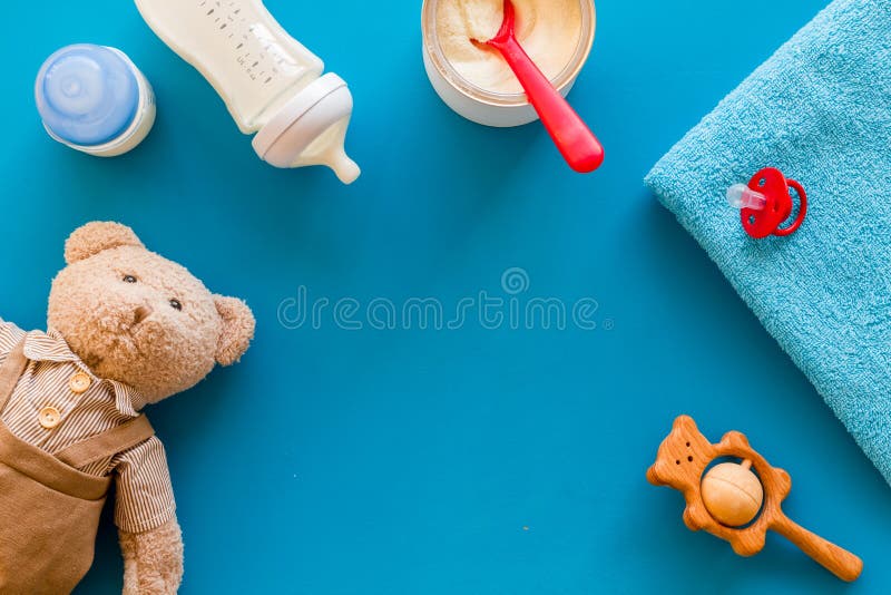 Baby Food Background with Toys and Accessories on Blue Table Top View ...
