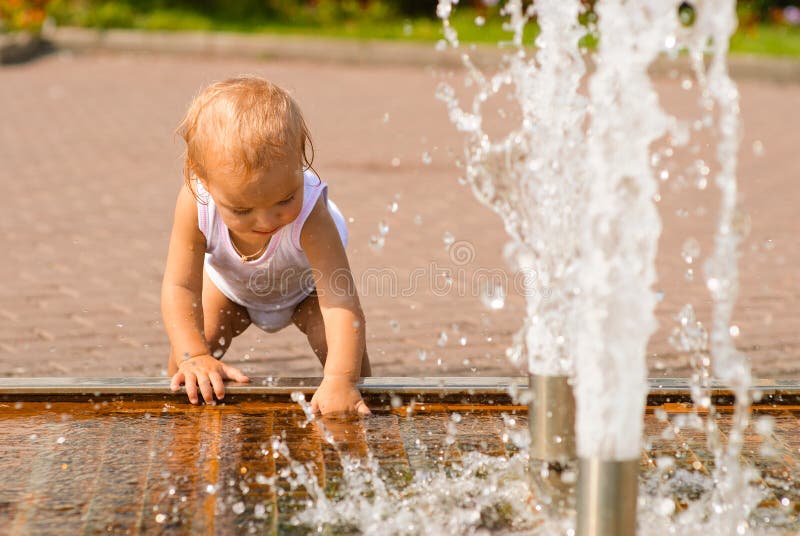 Baby about fountain stock photo. Image of drop, activity - 19322014