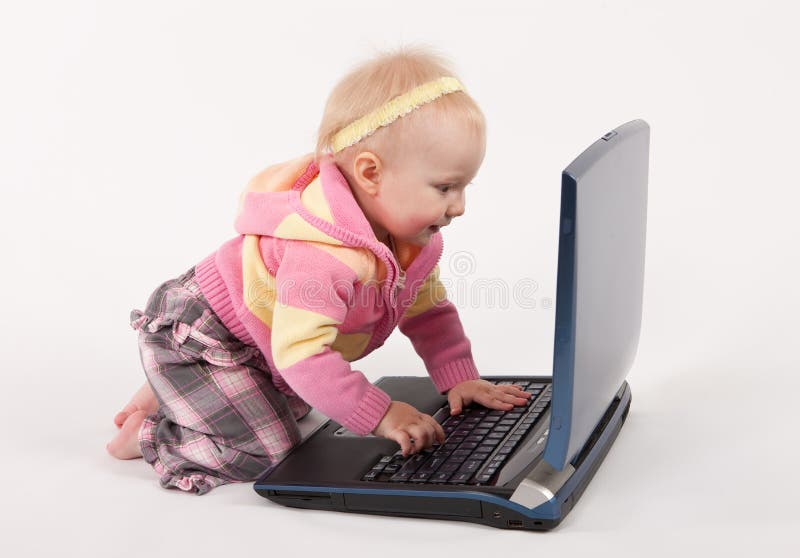 Baby at a Computer stock photo. Image of girl, interesting - 2266834