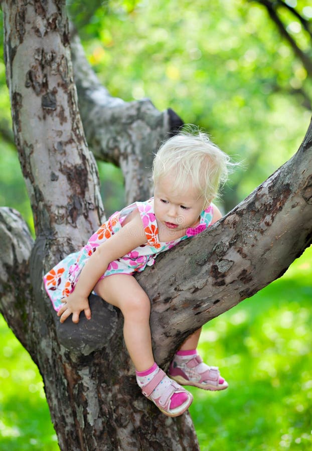 Baby girl climbing stock image. Image of female, happy - 20416477