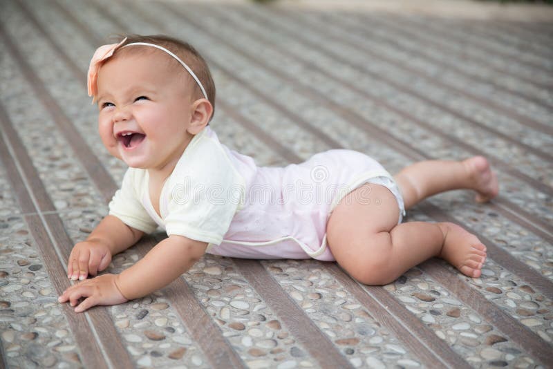 Baby girl crawling outside stock image. Image of child - 88864131