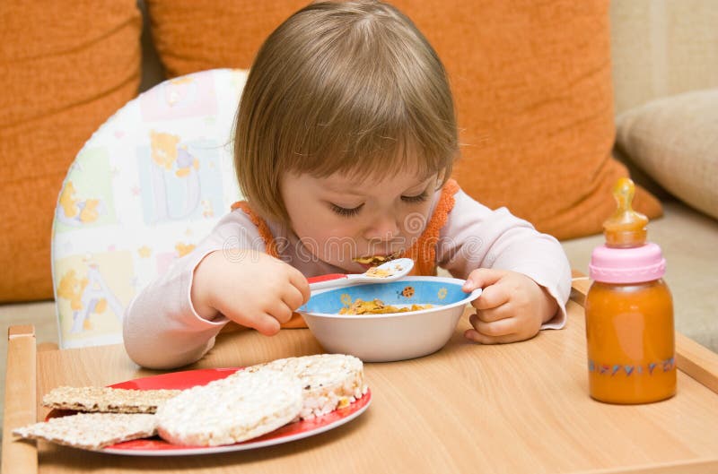Baby girl eating stock image. Image of caucasian, healthy - 10093551