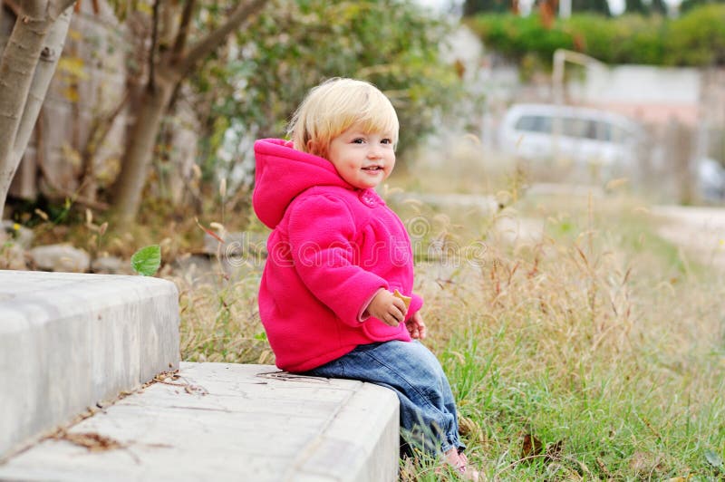 Baby girl in fall stock photo. Image of bright, baby - 75304356