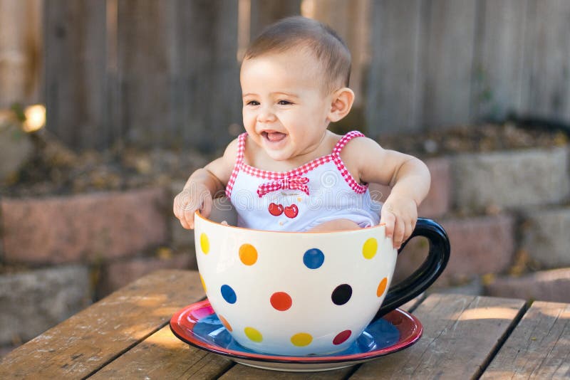 Happy And Cute Baby Girl In Giant Teacup Stock Photo - Image of inside ...