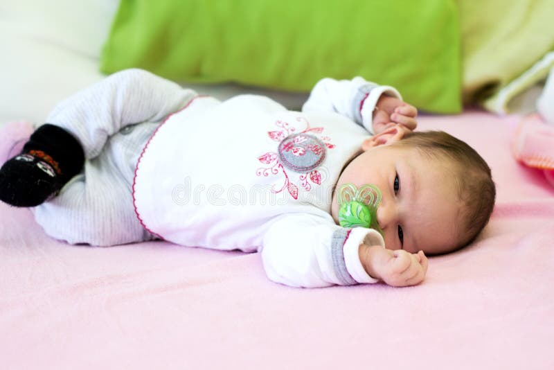 Baby Girl Lying stock image. Image of green, human, child - 24786747