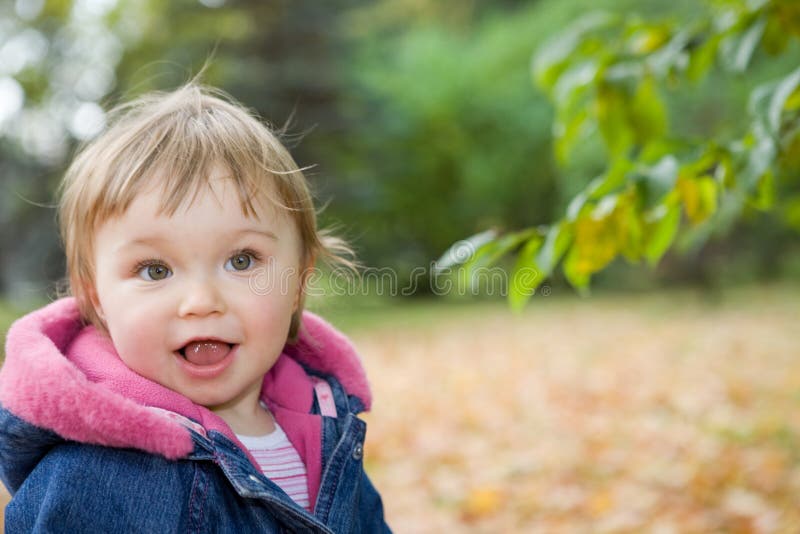 Baby girl in park stock image. Image of play, happy, orange - 6718381