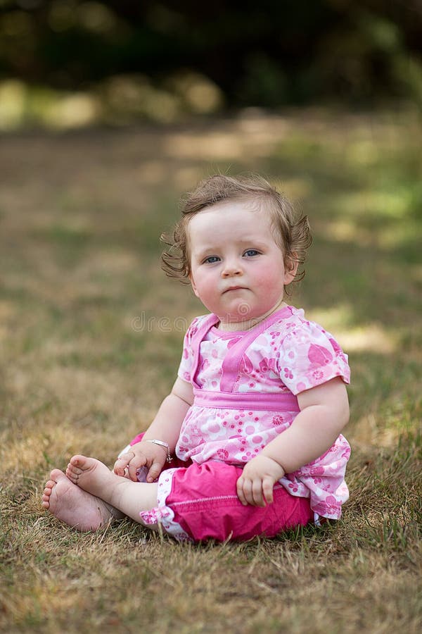 Baby Girl in Park stock image. Image of meadow, infant - 47485921