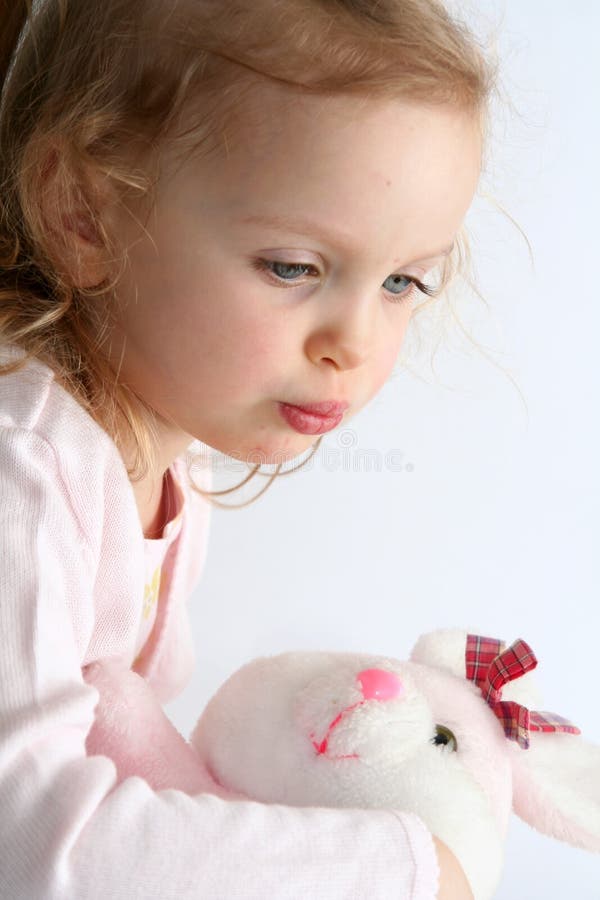 Baby girl and pink bunny stock photo. Image of pink, easter - 2112226