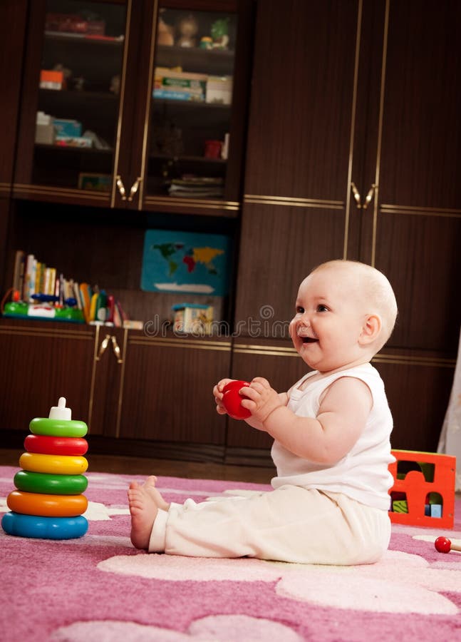 Baby girl playing stock image. Image of indoor, cute - 20144373