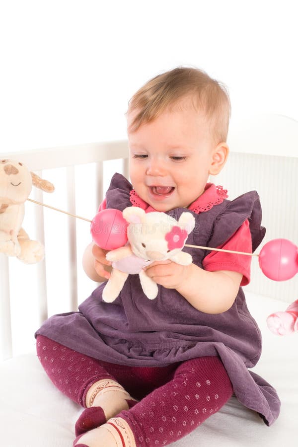 Baby playing with soft toy stock photo. Image of babies - 7627850