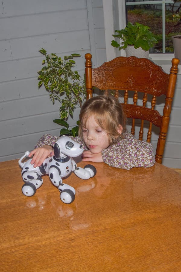 Baby Girl Playing Robot Dog Video without Processing Stock Photo ...