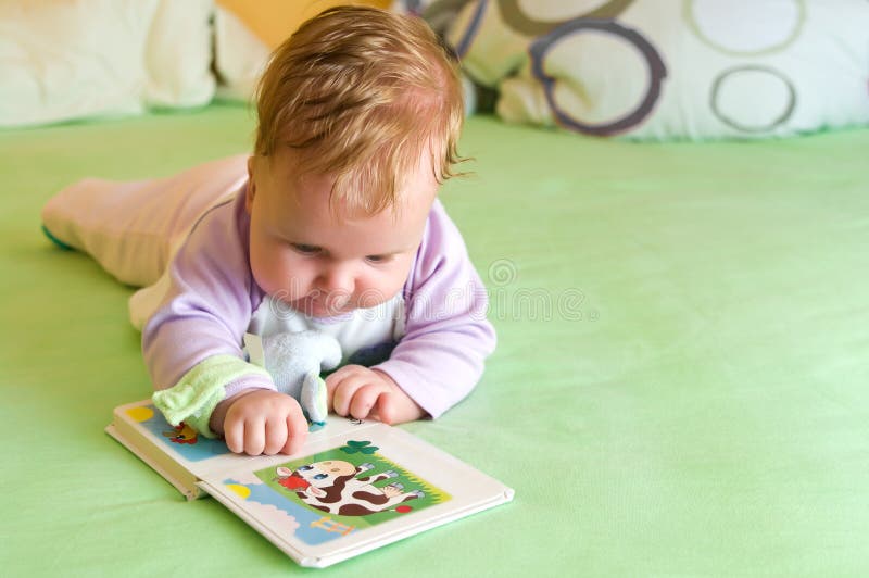 Baby girl reading stock photo. Image of cute, curious - 15932896