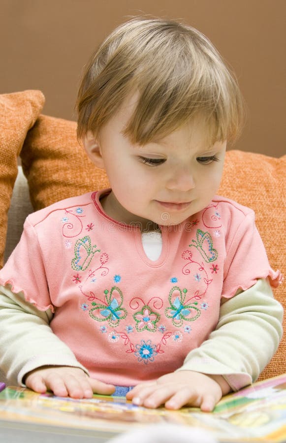 Baby girl reading stock image. Image of learning, people - 8190927