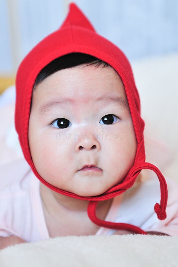 Baby girl with red hat stock photo. Image of child, asia - 23037812