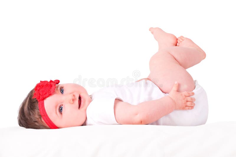 Baby girl with red ribbon. stock image. Image of fashion - 73629551