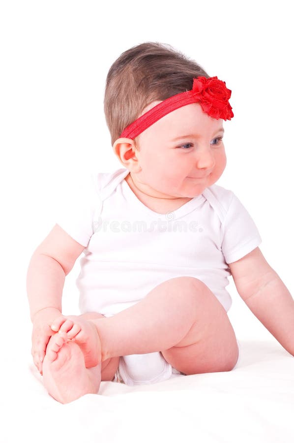 Baby girl with red ribbon. stock photo. Image of amaze - 72562552