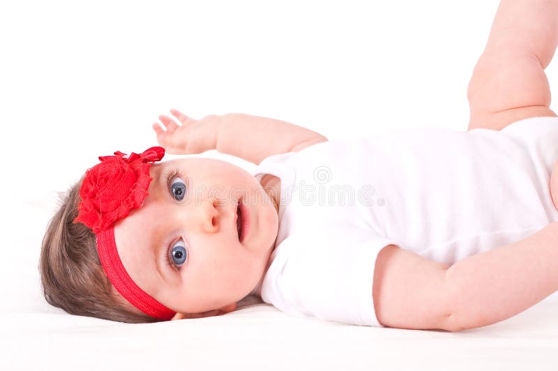 Baby girl with red ribbon. stock image. Image of people - 73032579