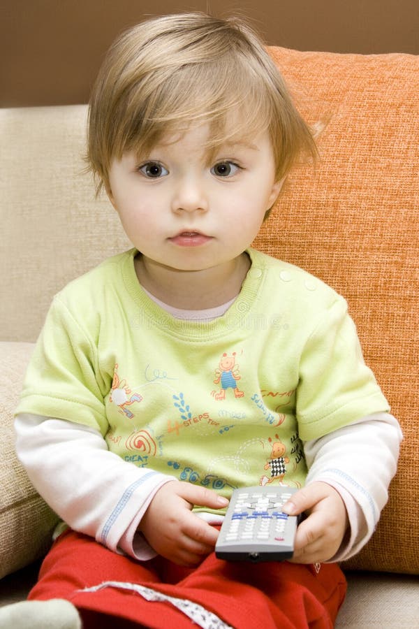 Baby Girl with Remote Control Stock Image - Image of beautiful, baby ...