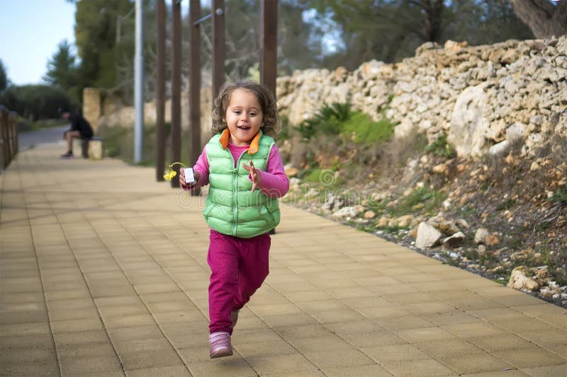 Baby girl is running stock image. Image of caucasian - 113179505