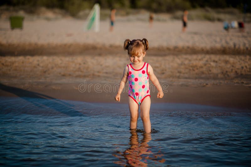 Baby girl in the sea stock image. Image of childhood - 43105447