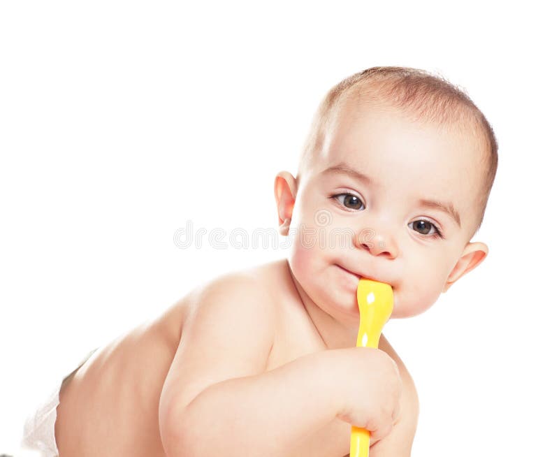Baby girl with spoon stock photo. Image of innocence - 17772232