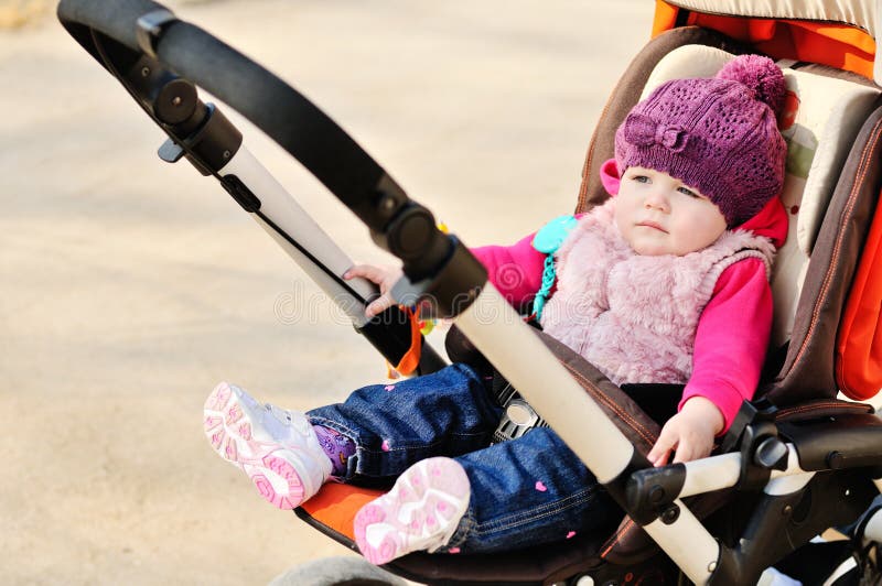 Baby girl in stroller stock image. Image of beret, baby - 50669679