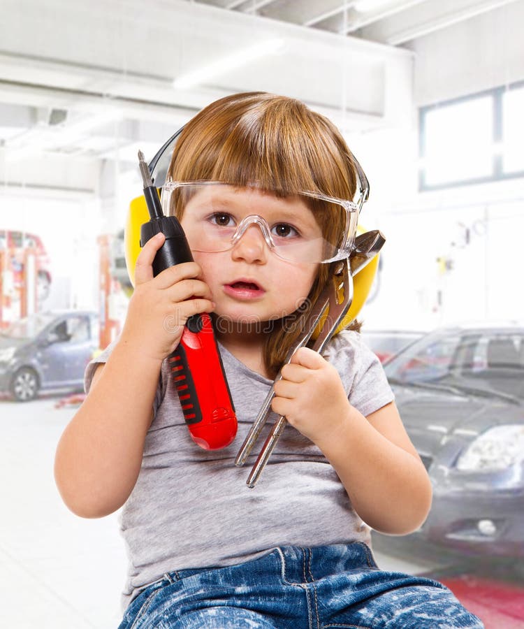 Baby Girl with Working Tool Stock Image - Image of happy, young: 36479355
