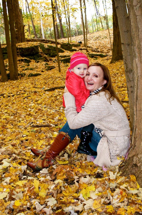 A Baby Girl and a Young Mother in Fall Stock Photo - Image of happy ...