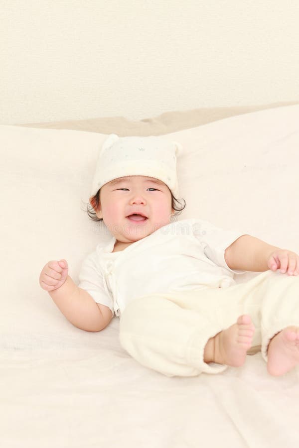 Baby in a good mood stock image. Image of innocence - 197941435