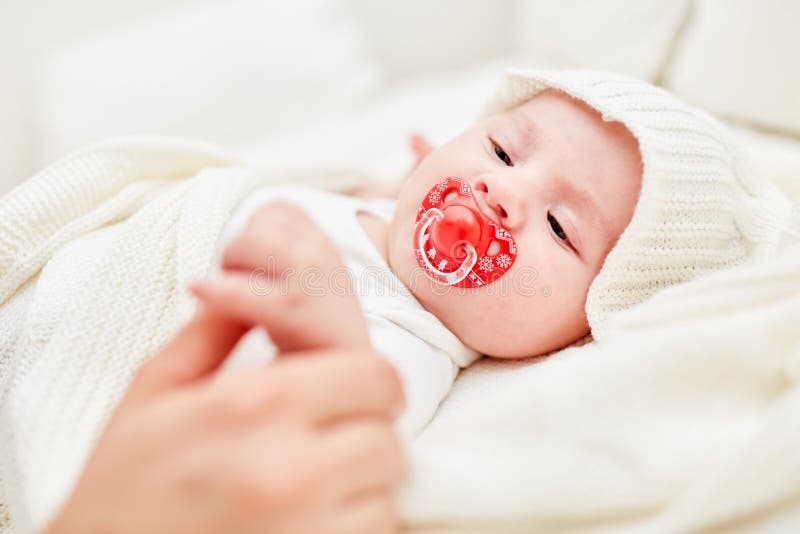 Baby Grabs the Thumb of an Adult Stock Image - Image of newborn, hands ...