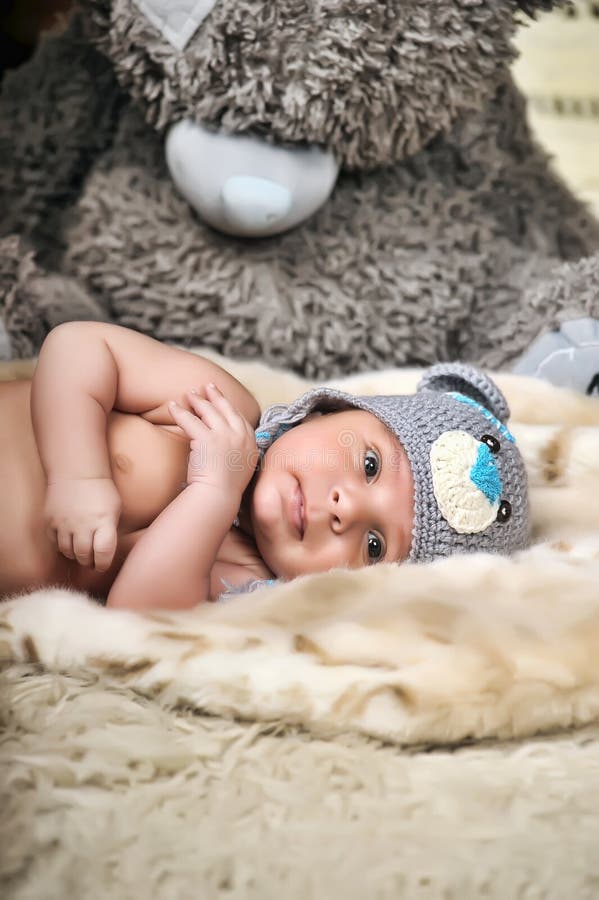 Baby in gray hat stock image. Image of health, happy - 34927649