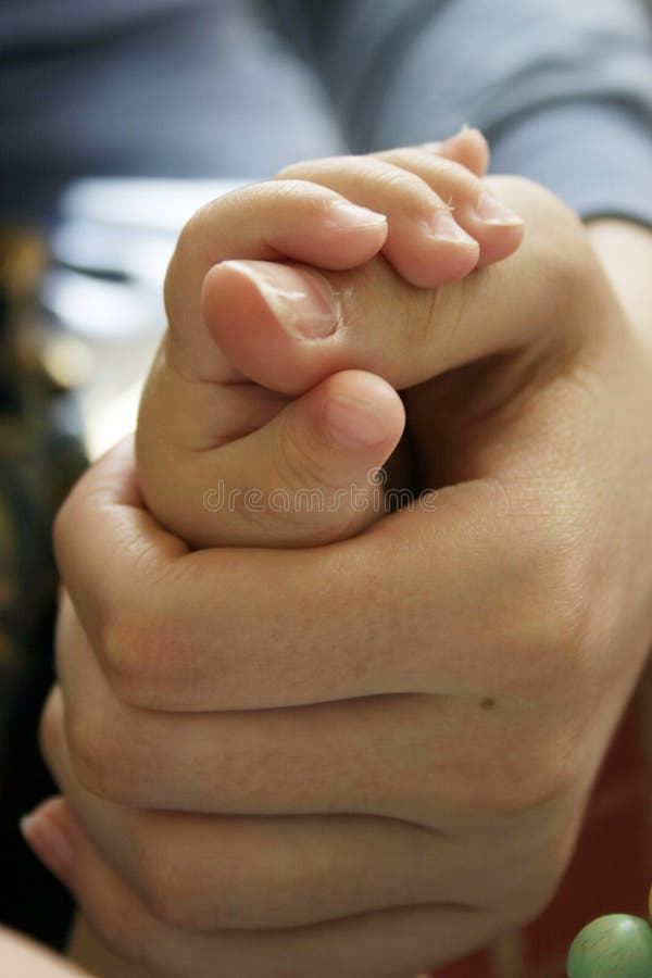 Baby hand stock photo. Image of together, finger, bodypart - 1358698