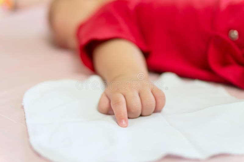 Baby hand on the bed stock photo. Image of family, concept - 66777976