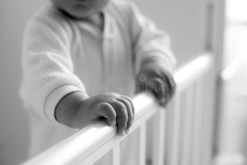 Baby Hand Holding on To the Bed Stock Image - Image of gently, grate ...