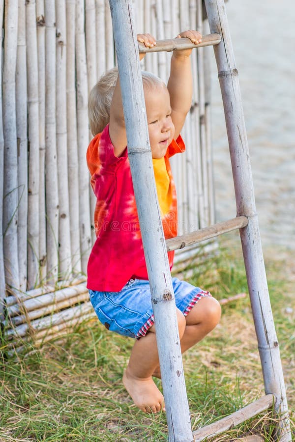 Baby hanging stock photo. Image of hanging, infant, healthy - 50658074