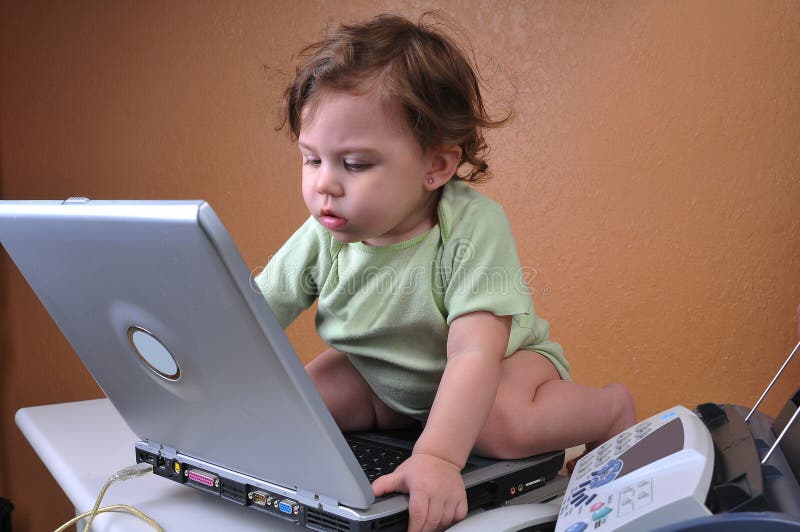 Baby Hard at Work on Her Laptop Stock Photo - Image of sitting, working ...