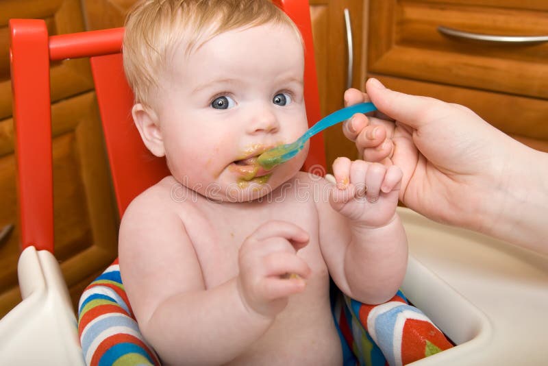 Baby Has First Food stock photo. Image of baby, feeding - 18666162