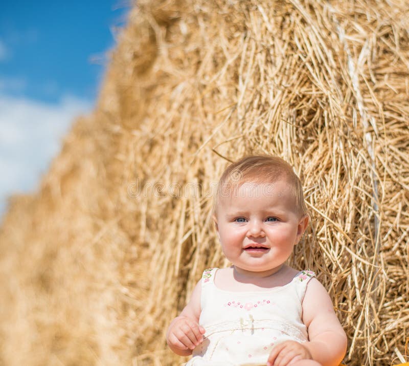 Baby on hay stock photo. Image of beautiful, little, expression - 32370336