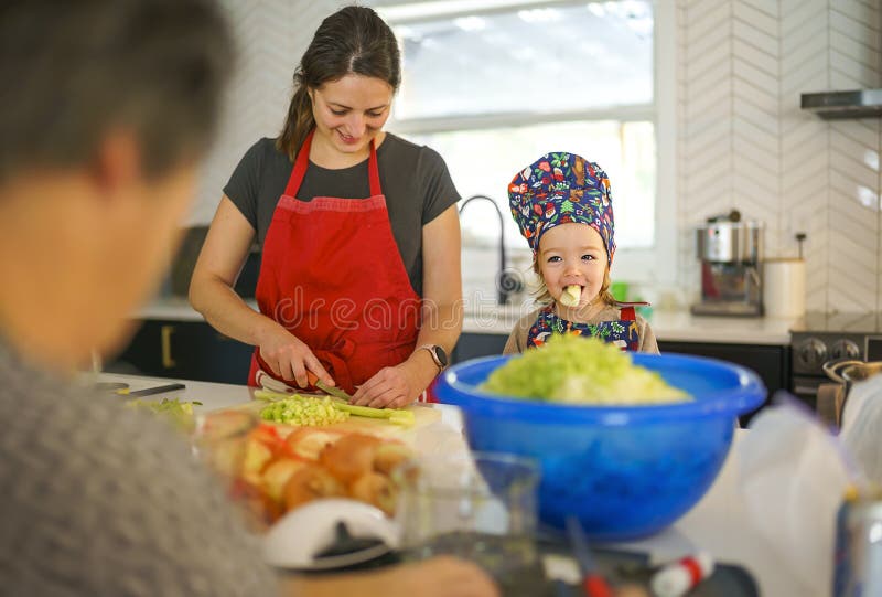 Baby Helping Mom To Cook in the Dinner Room Stock Image - Image of ...