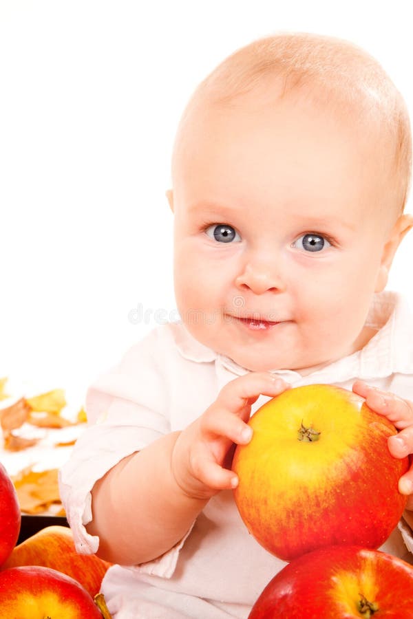Baby eating apple stock image. Image of person, copyspace - 26605401
