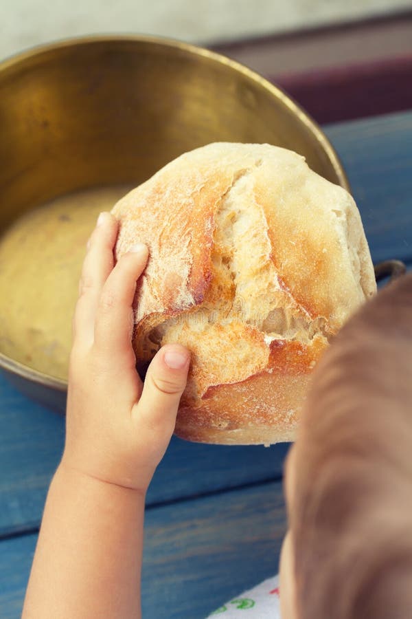251 Baby Holding Fresh Bread Stock Photos - Free & Royalty-Free Stock ...