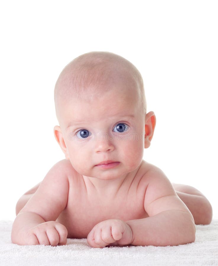 Baby holds his head stock image. Image of lying, innocence - 26623891